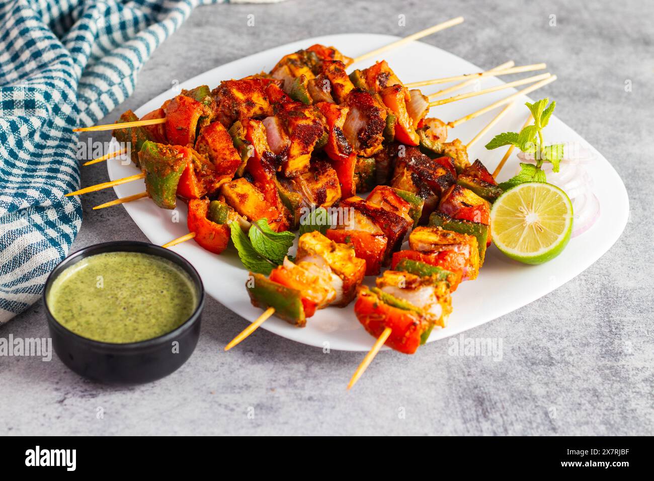 selective focus of famous Indian dish Paneer Tikka Masala Tandoor or ...