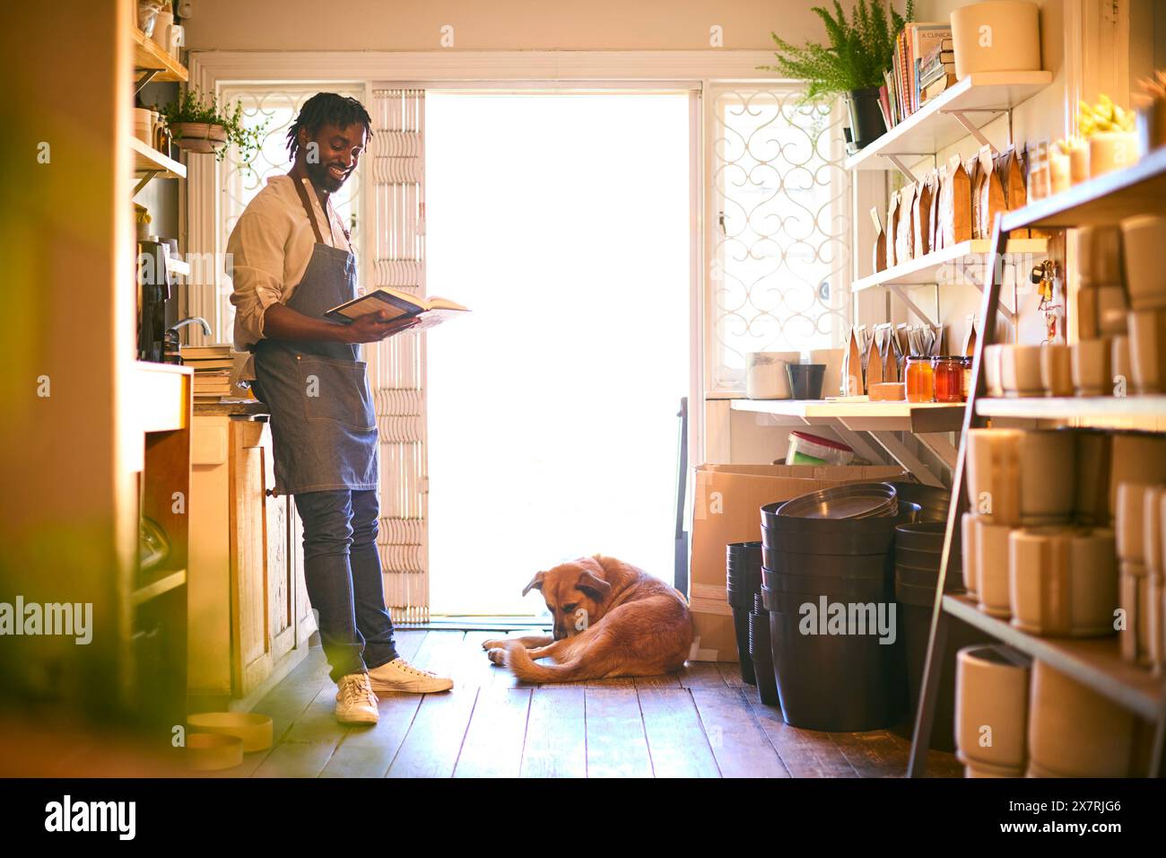 Man With Pet Dog Working In Sustainable Plastic Free Grocery Store ...