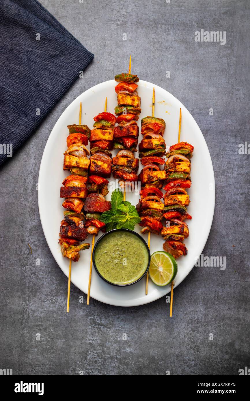 selective focus of famous Indian dish Paneer Tikka Masala Tandoor or ...