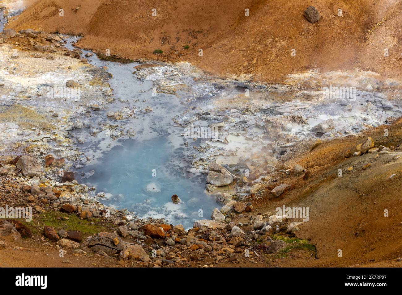 Steaming hot springs at Seltun Geothermal Area in Krysuvik with orange ...