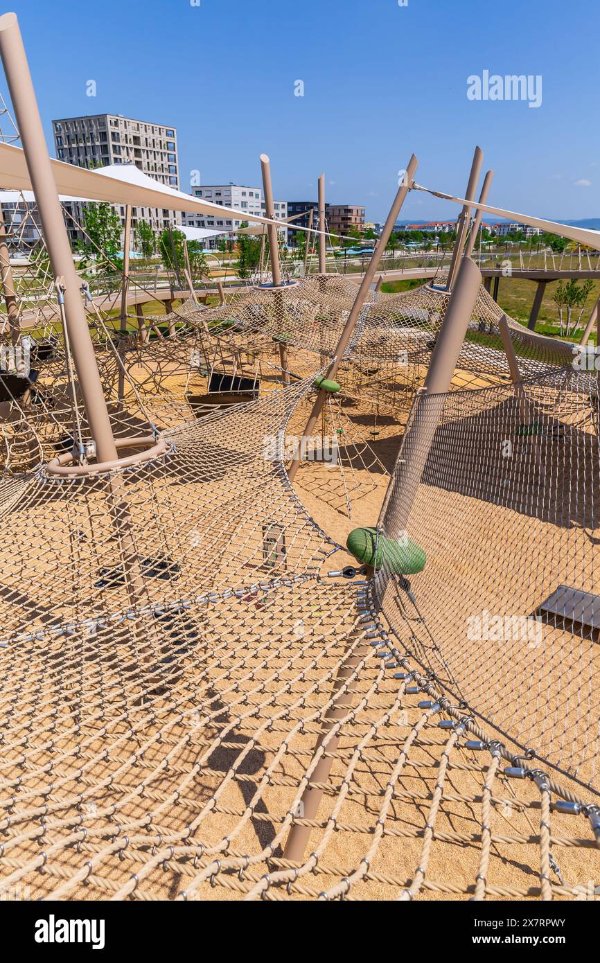 Large public city playground with slides and climbing frame, panorama ...