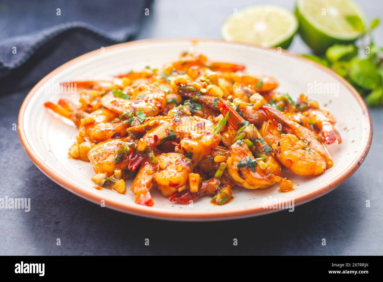 selective focus of Butter Garlic Prawn with a black background Stock ...