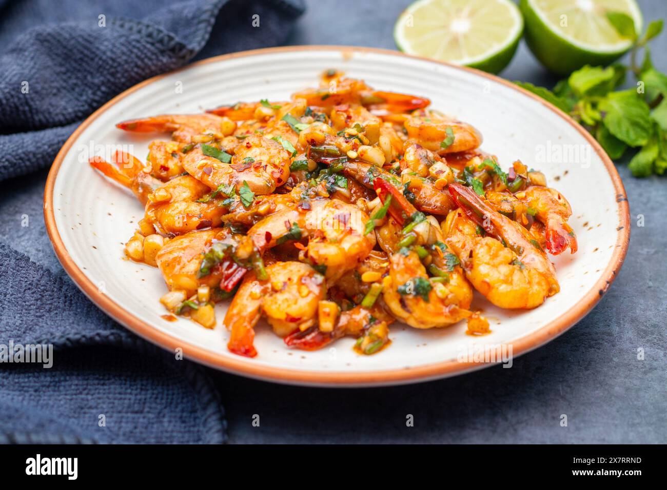 selective focus of Butter Garlic Prawn with a black background Stock ...