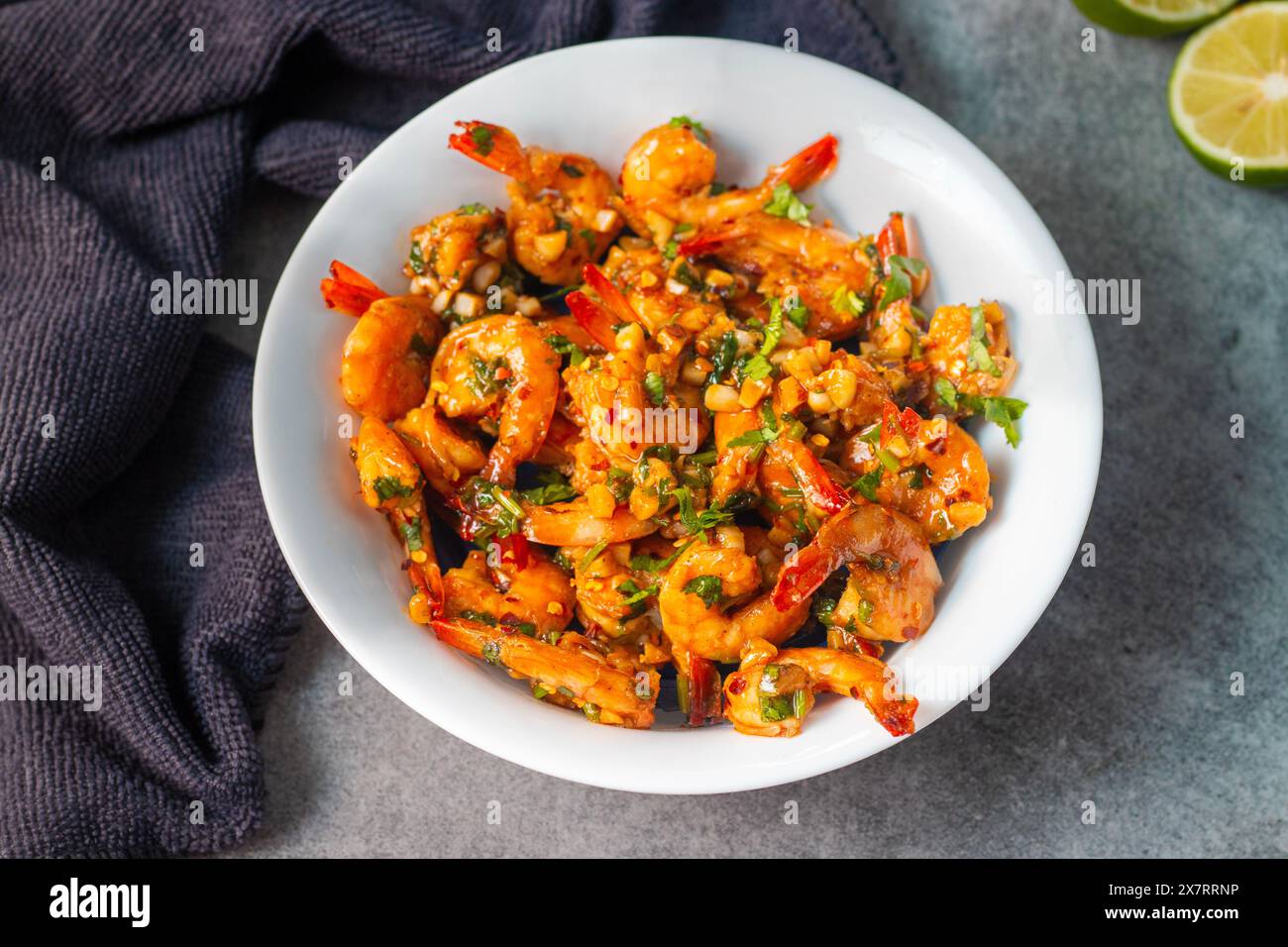 selective focus of Butter Garlic Prawn with a black background Stock ...