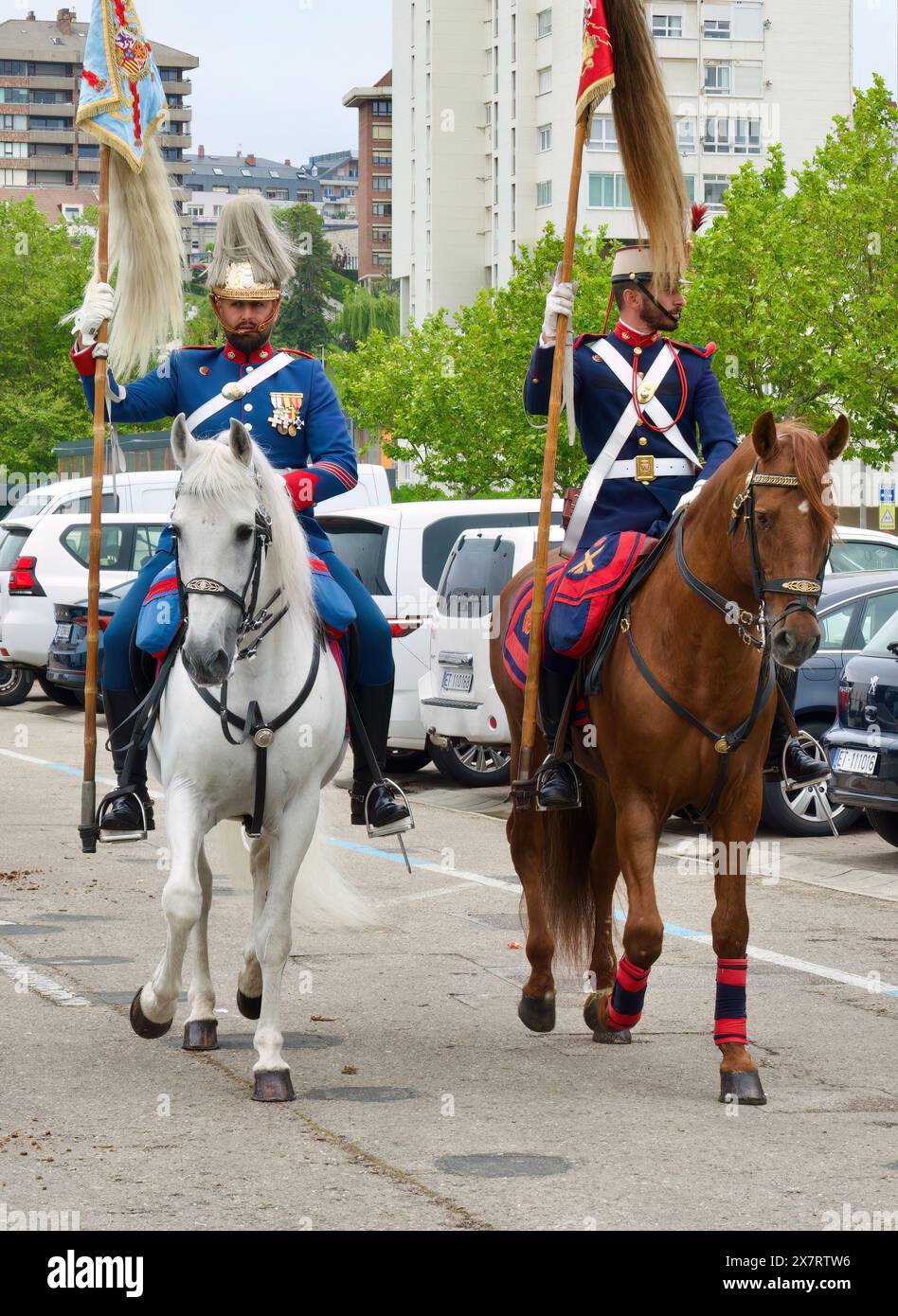 Two soldiers of the Royal Guard in dress uniform on horseback riding ...