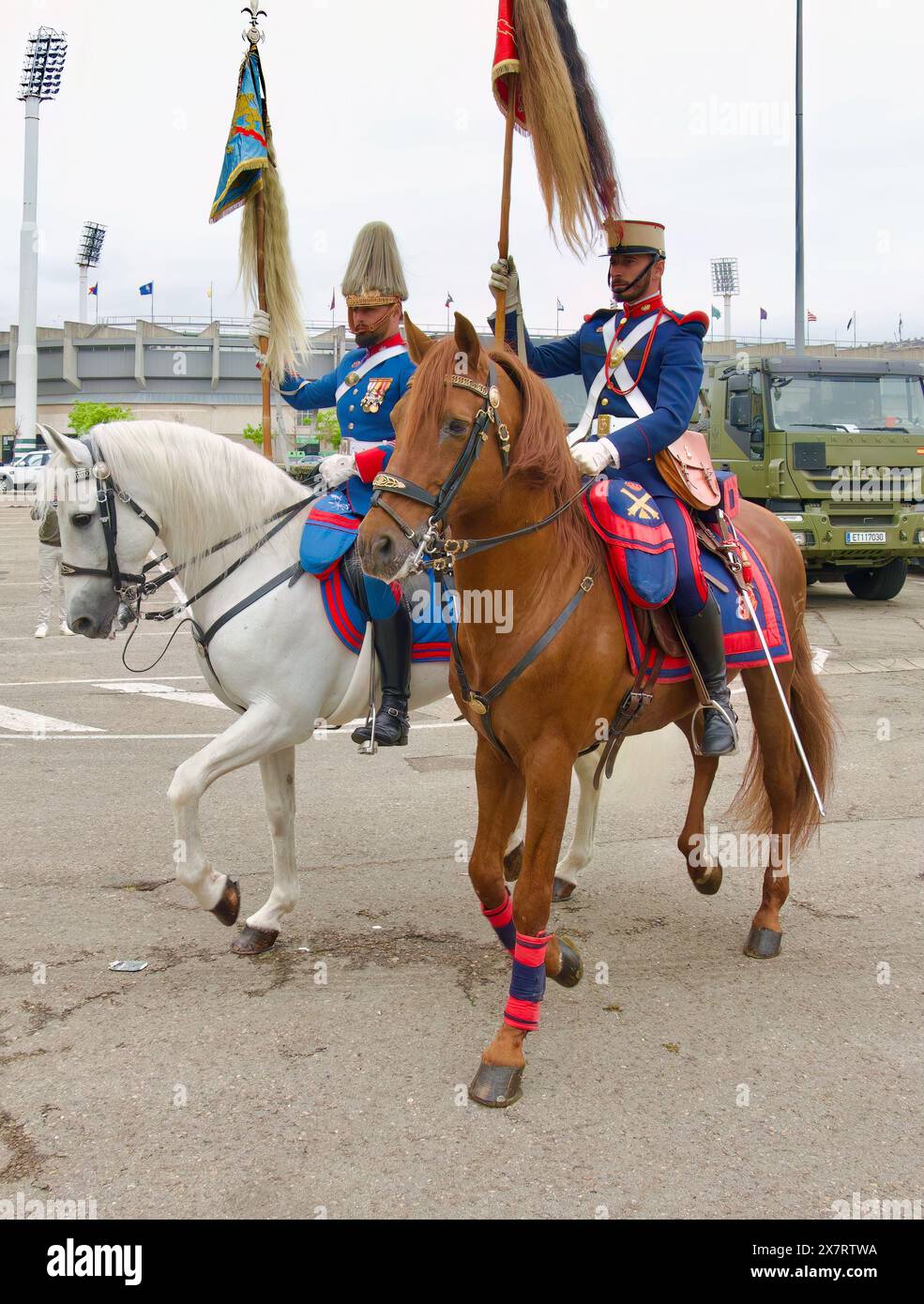 Two soldiers of the Royal Guard in dress uniform on horseback riding ...