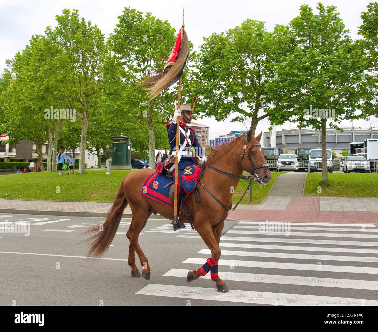 Royal Guard soldier in dress uniform on horseback riding towards ...