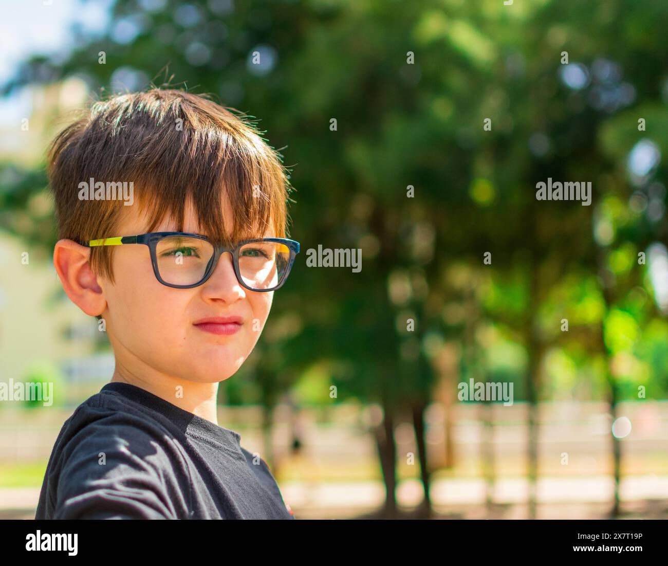portrait of a young boy gazing at the horizon Stock Photo - Alamy