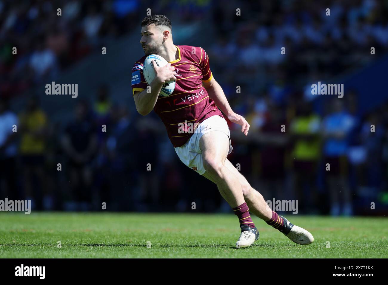 Huddersfield Giants' Jake Connor runs with the ball during the Betfred ...