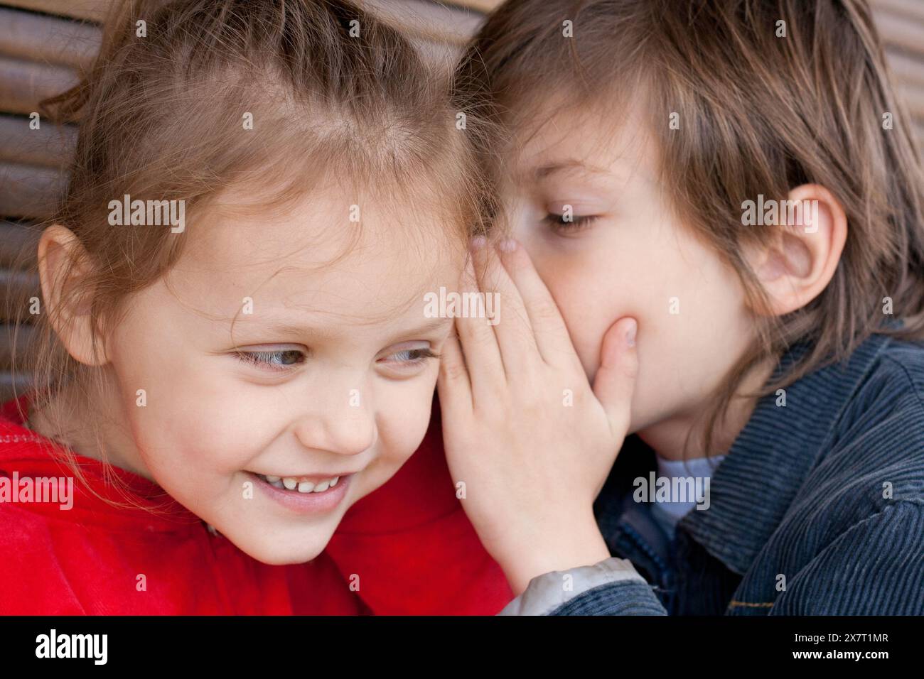 Sharing secret boy hi-res stock photography and images - Alamy