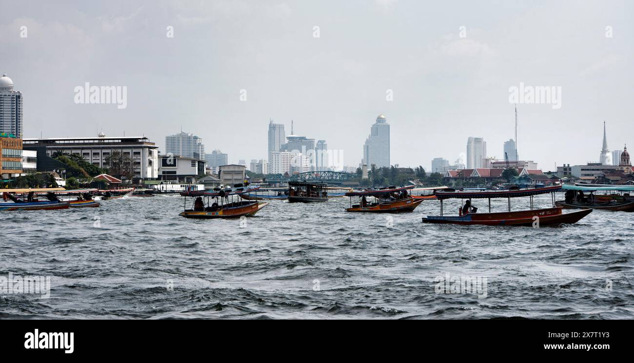 Thailand, Bangkok, view of the Chao Praya river and the skyline of the ...