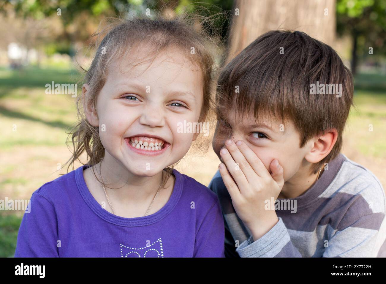 Sharing secret boy hi-res stock photography and images - Alamy