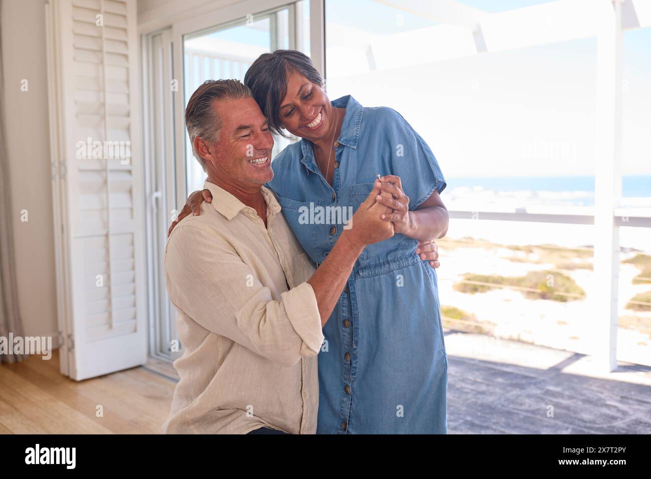 Mature Couple With Man Proposing Marriage Kneeling And Giving Woman