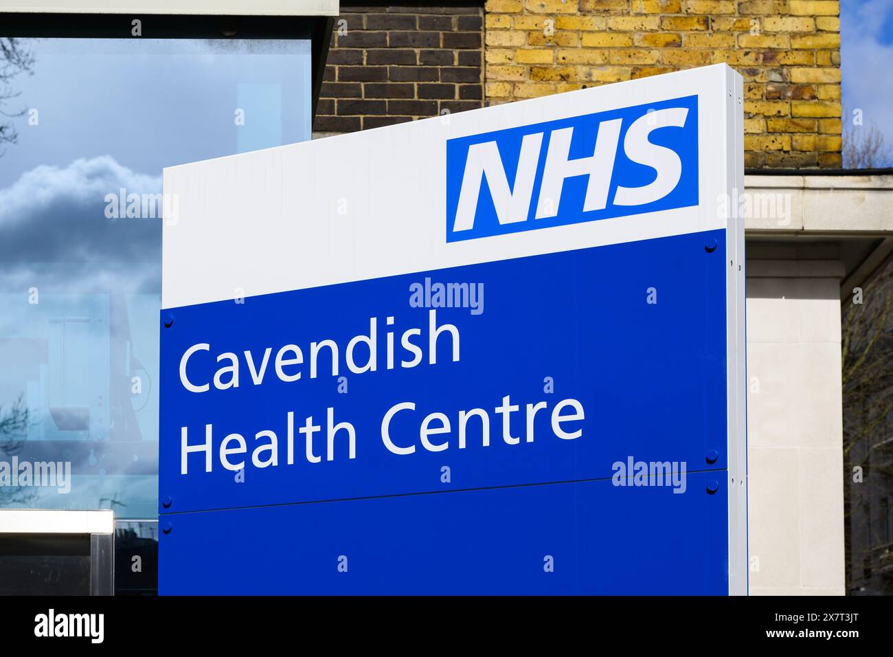 London, UK - March 22, 2024; Closeup of blue and white NHS sign for UK ...