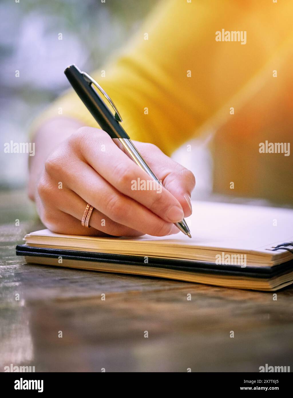 Woman, hand and pen with paper for writing or planning, checklist on ...