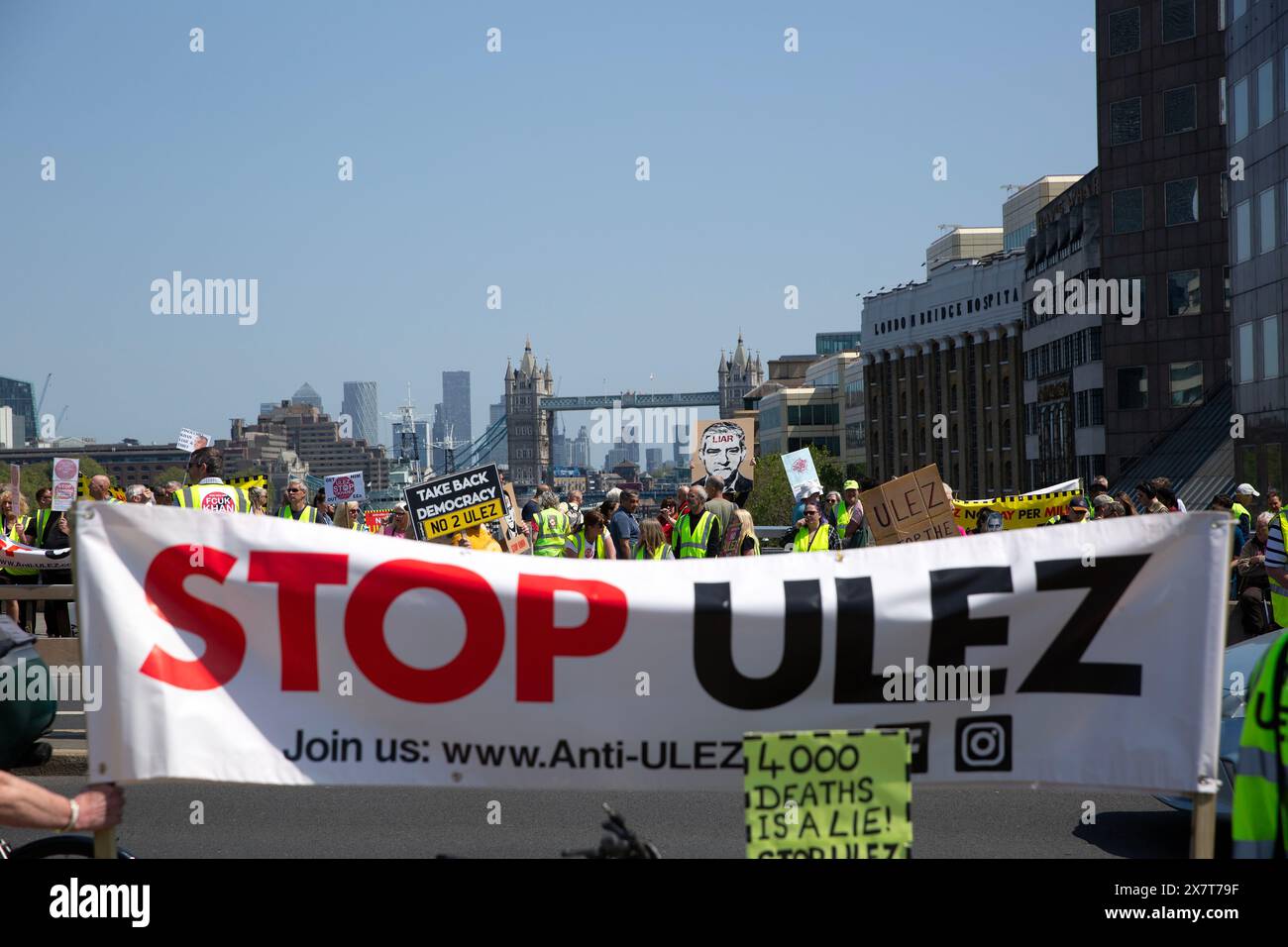 Banners and placards are seen as participants gather for an anti-ULEZ ...