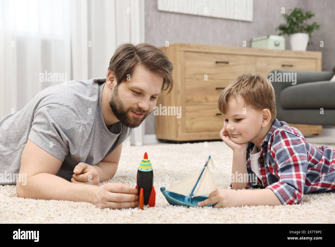 Dad kid playing toys home hi-res stock photography and images - Alamy