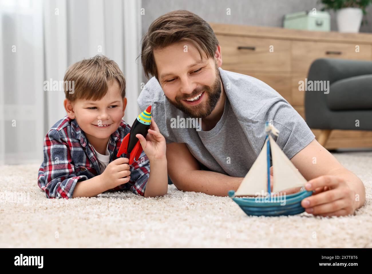 Dad kid playing toys home hi-res stock photography and images - Alamy