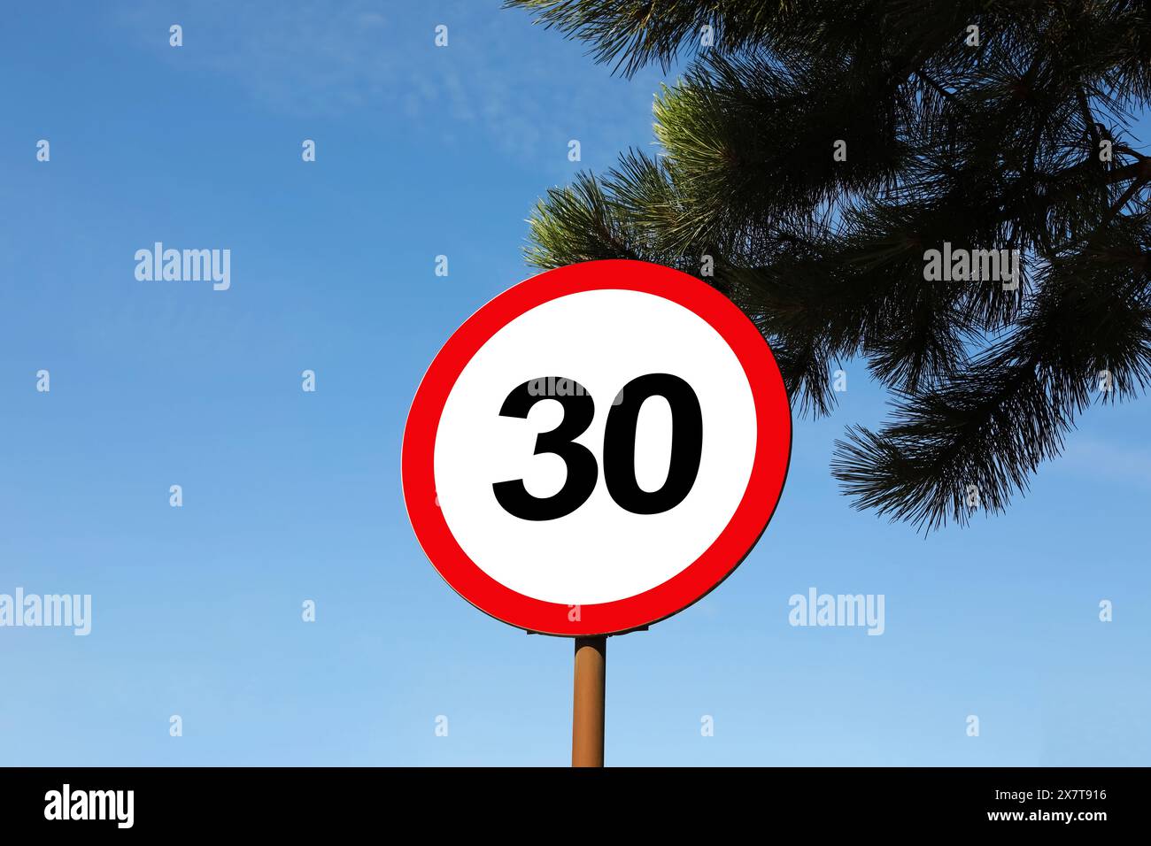 Road sign Maximum speed limit against blue sky Stock Photo - Alamy