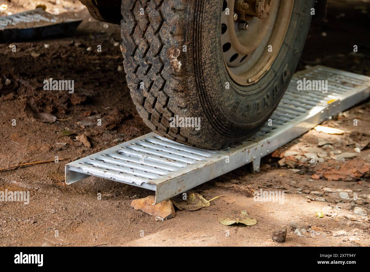 Recovery equipment for unstacking 4x4 vehicle out of muddy road, sand ...