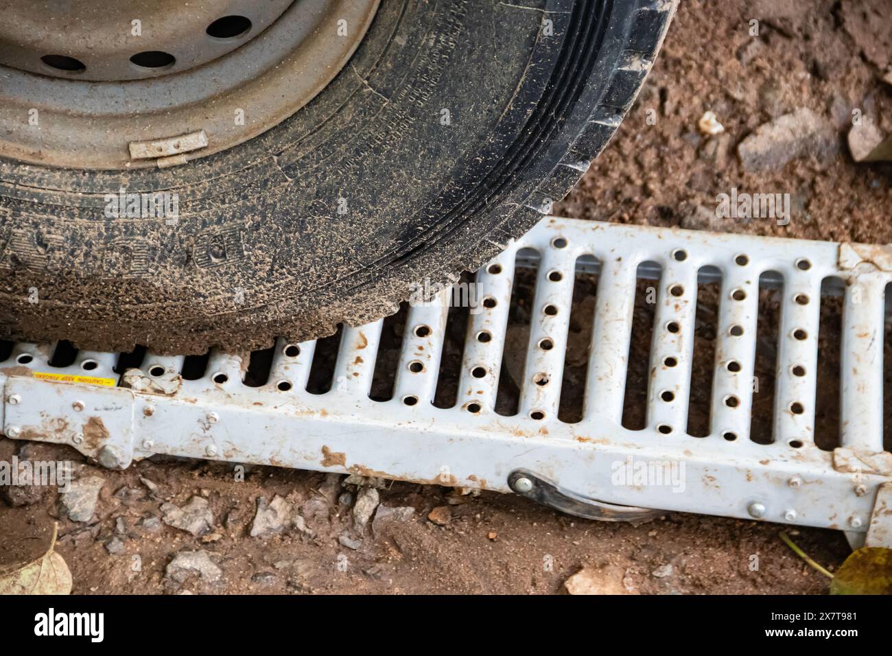Recovery equipment for unstacking 4x4 vehicle out of muddy road, sand ...