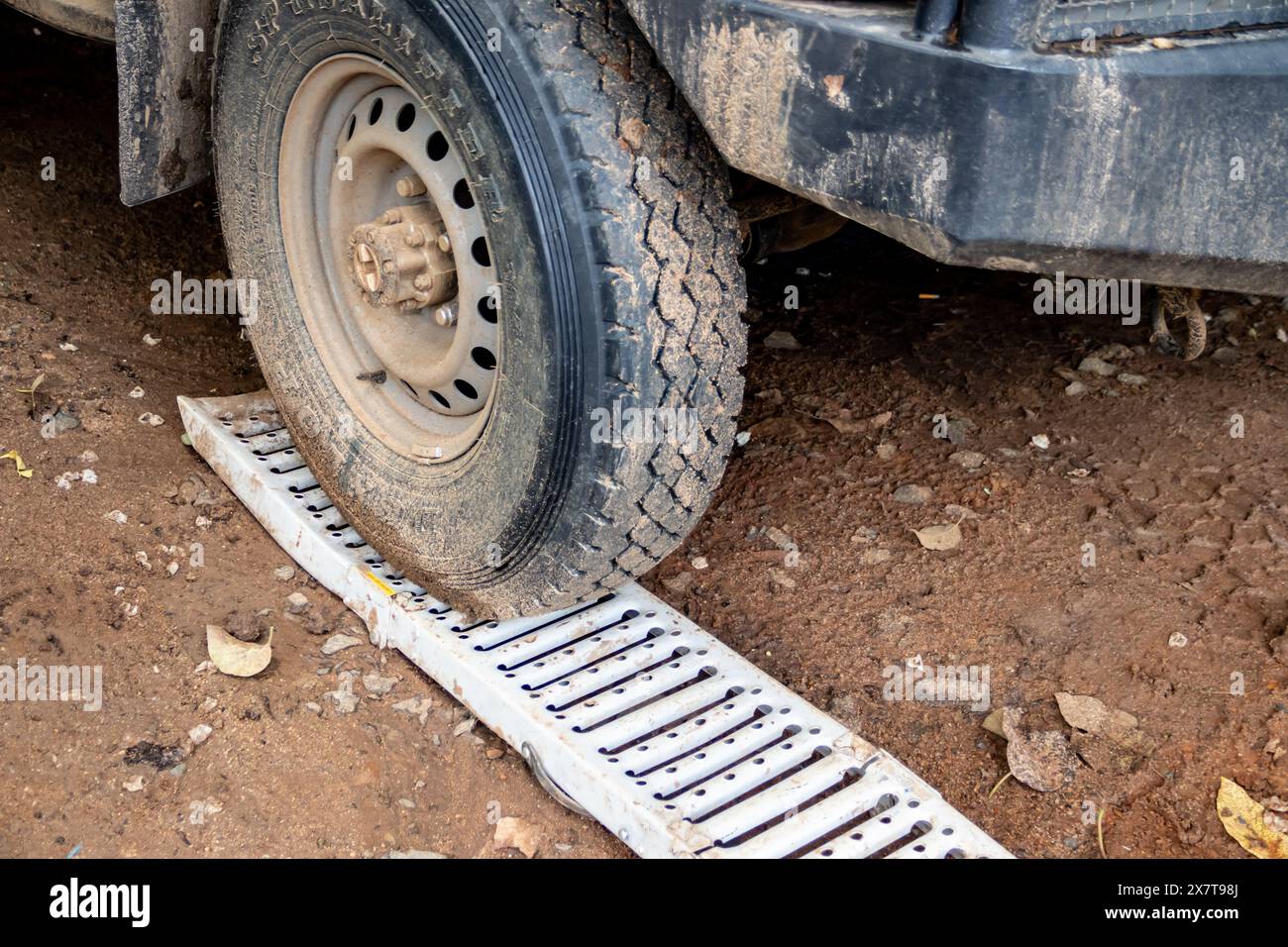 Recovery equipment for unstacking 4x4 vehicle out of muddy road, sand ...