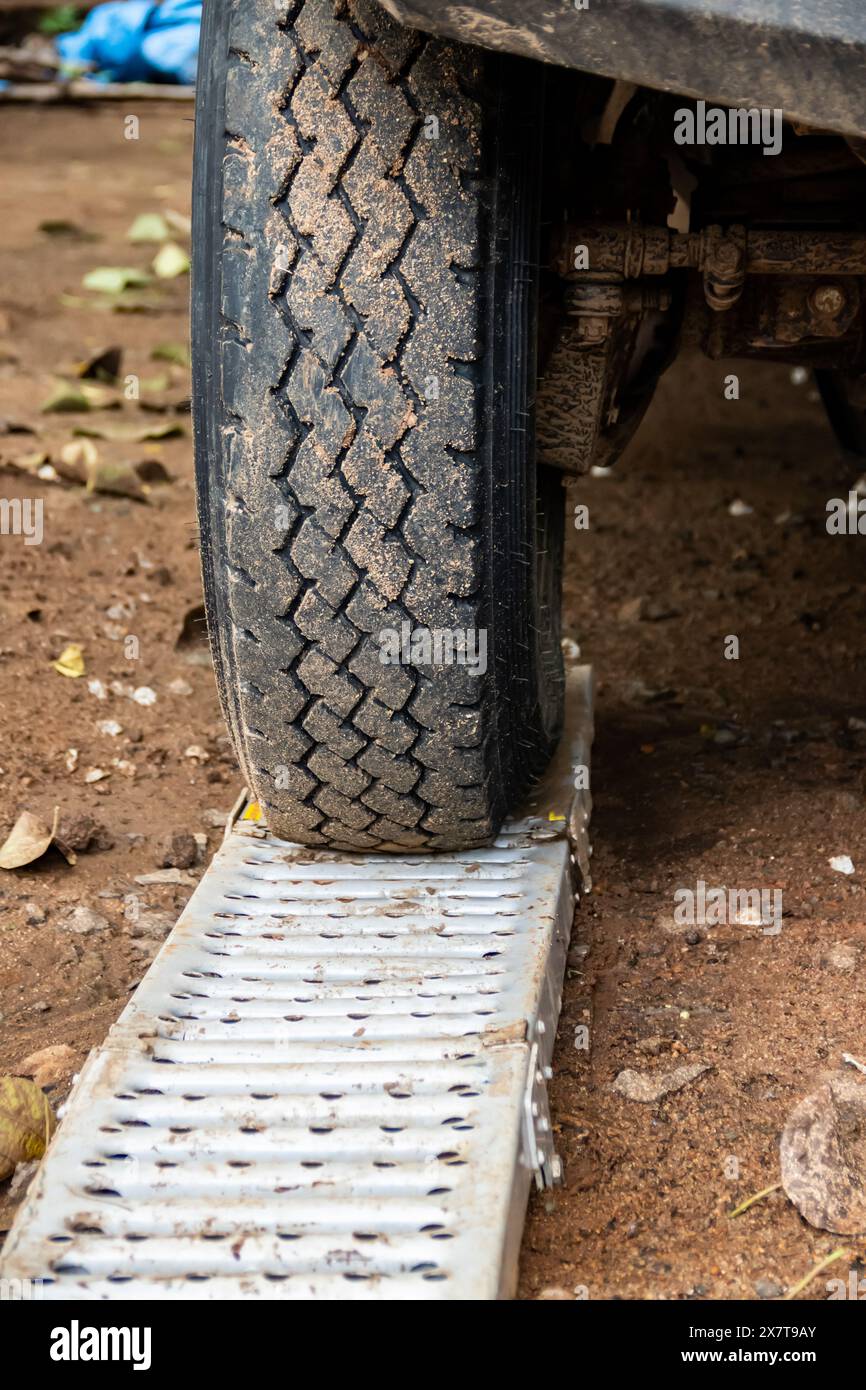 Recovery equipment for unstacking 4x4 vehicle out of muddy road, sand ...