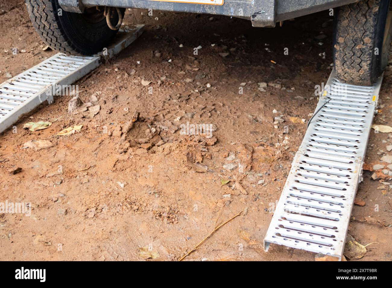 Recovery equipment for unstacking 4x4 vehicle out of muddy road, sand ...