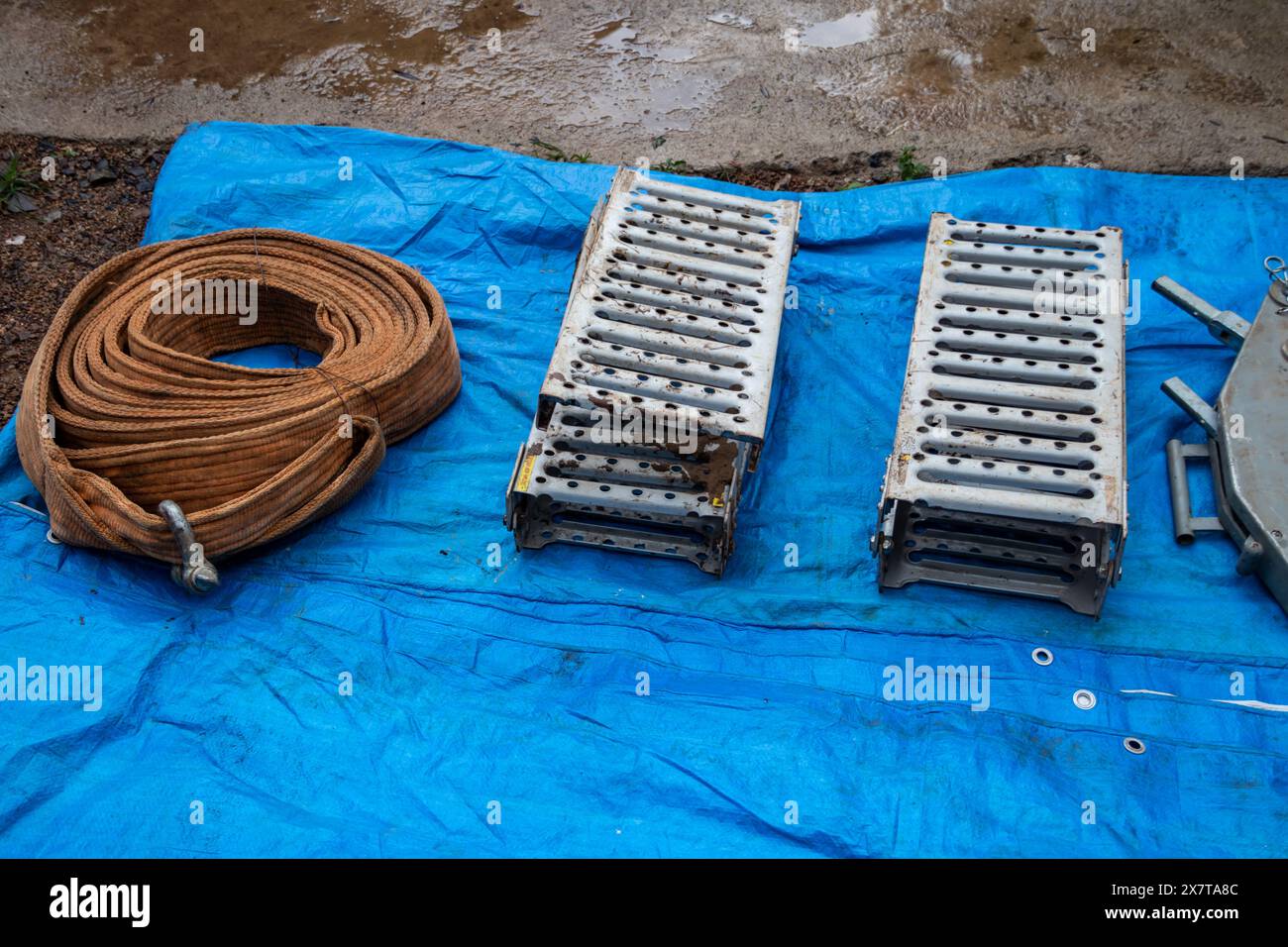 Recovery equipment for unstacking 4x4 vehicle out of muddy road ready ...