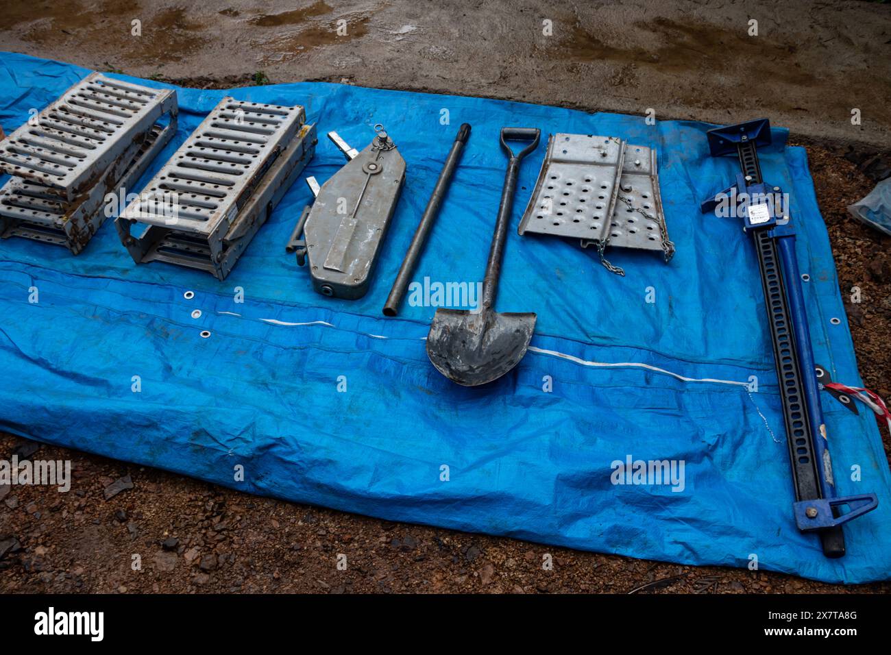 Recovery equipment for unstacking 4x4 vehicle out of muddy road ready ...