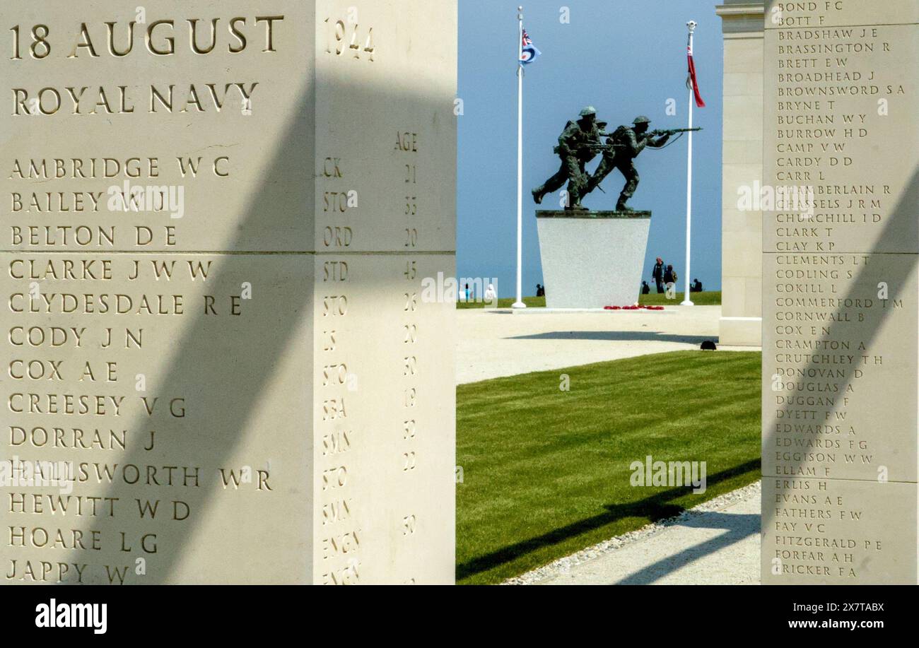 The British Normandy Memorial, France. 3 Soldiers in a charge position ...