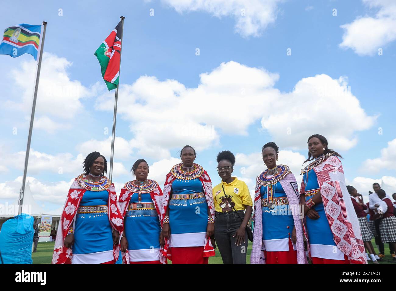 Masaai Osim Jec Kisaju choir pose for a photo during the world Bee day ...