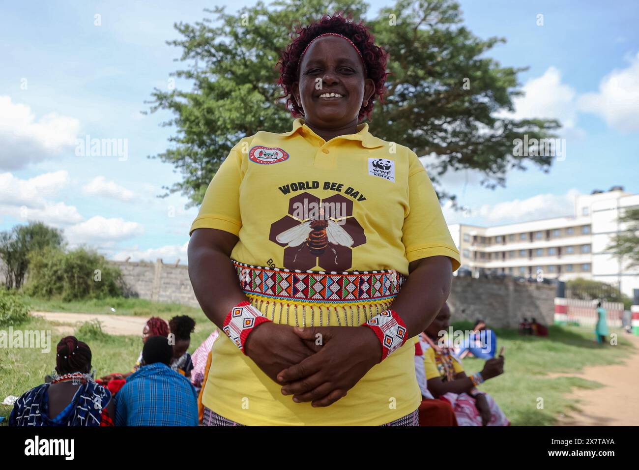 A local bee farmer from Kisaju Kajiado county, poses for a photo during ...
