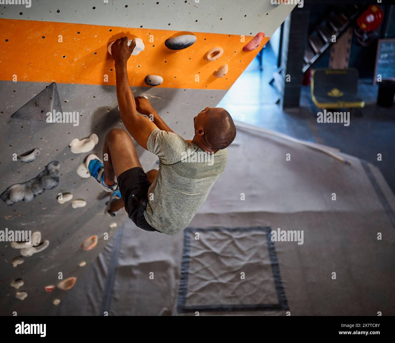 Black man climbing up hi-res stock photography and images - Alamy