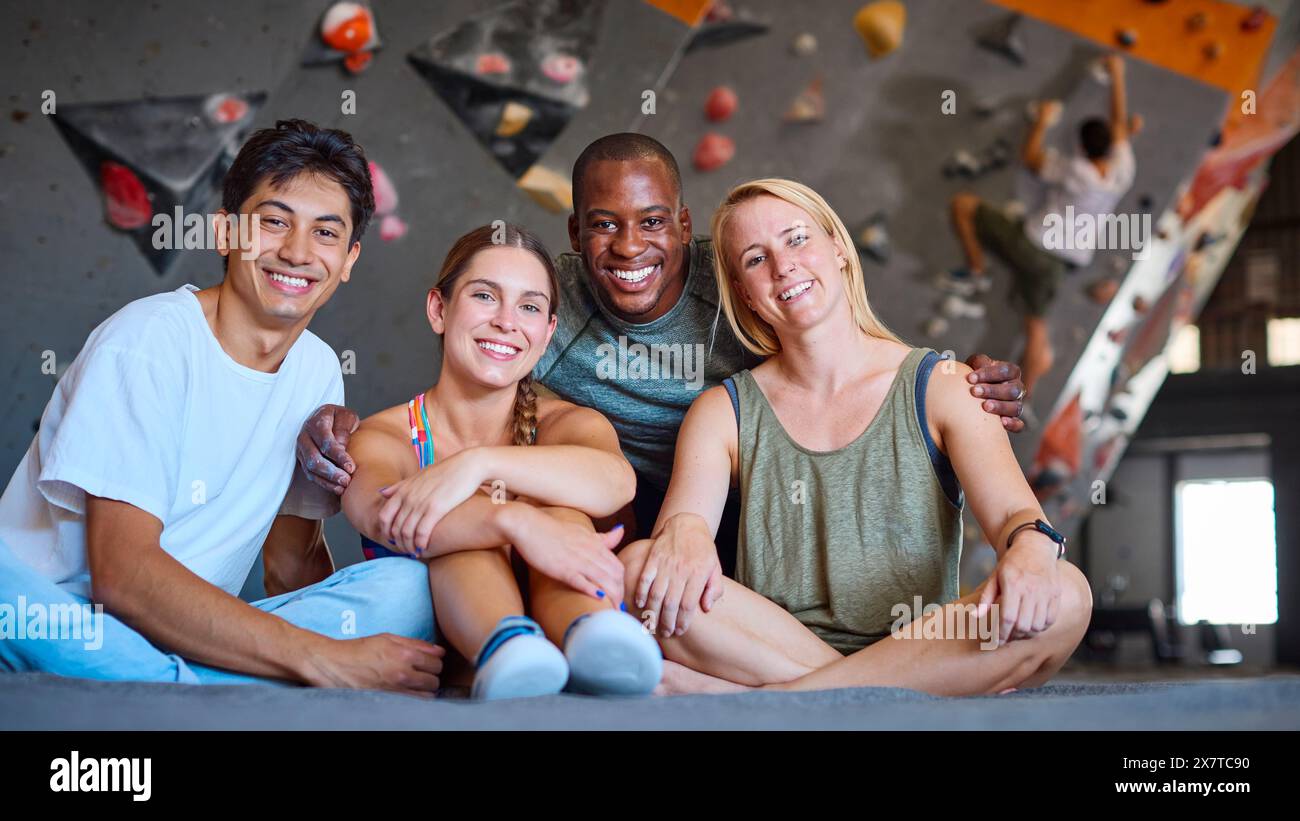 Portrait Of Climbers And Instructors Taking A Break Sitting By Climbing ...