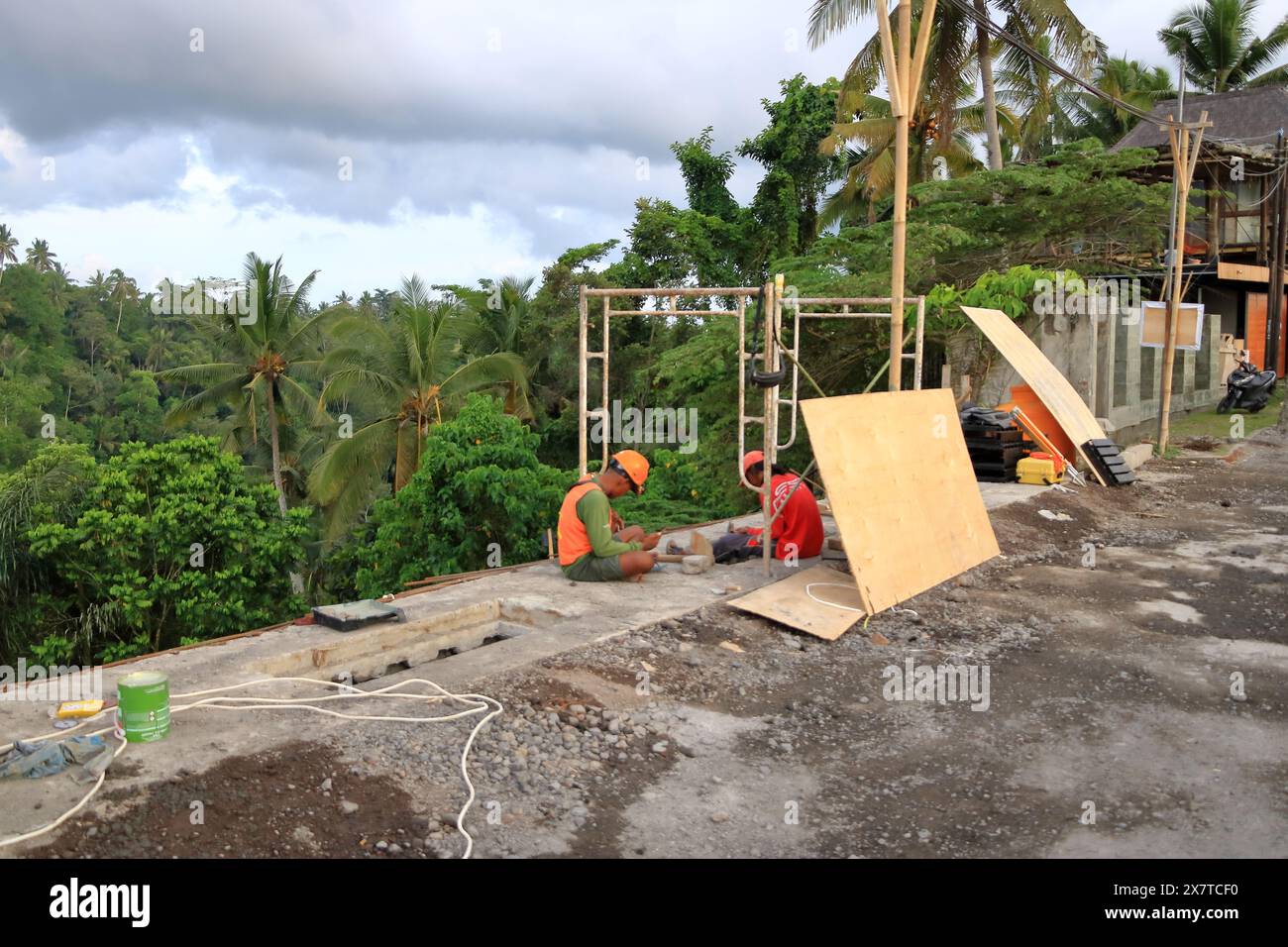Bali in Indonesia - January 31 2024: construction workers building ...