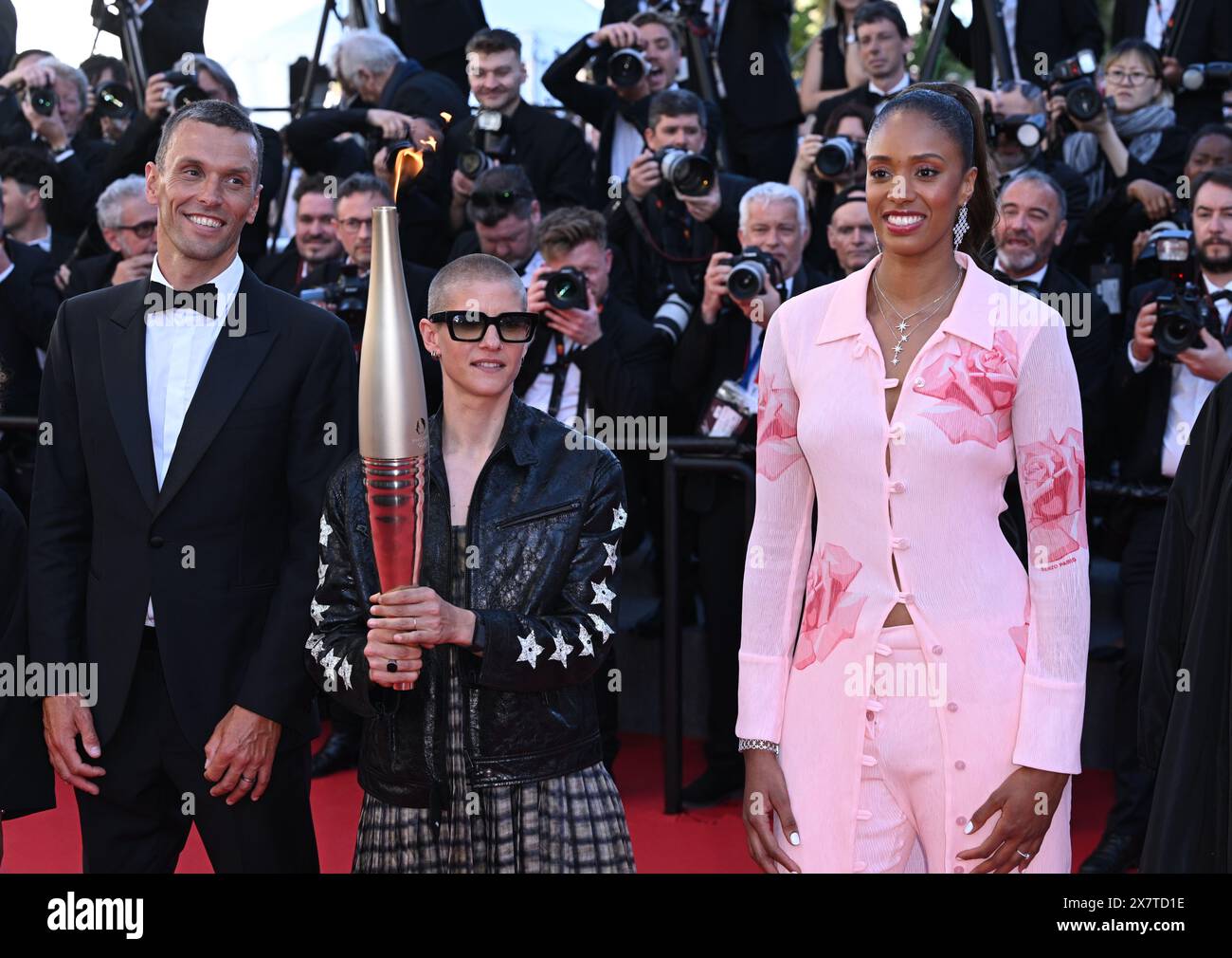 (left-right) Alexis Hanquinquant, Marie Patouillet, holding the Olympic ...