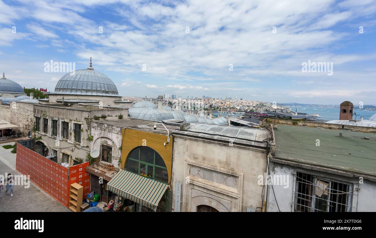 photography of a few old buildings and in background Istanbul city ...