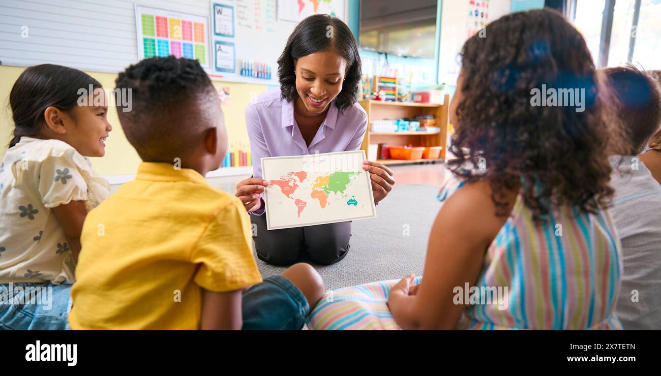 Female Primary Or Elementary School Teacher In Multi-Cultural Class ...