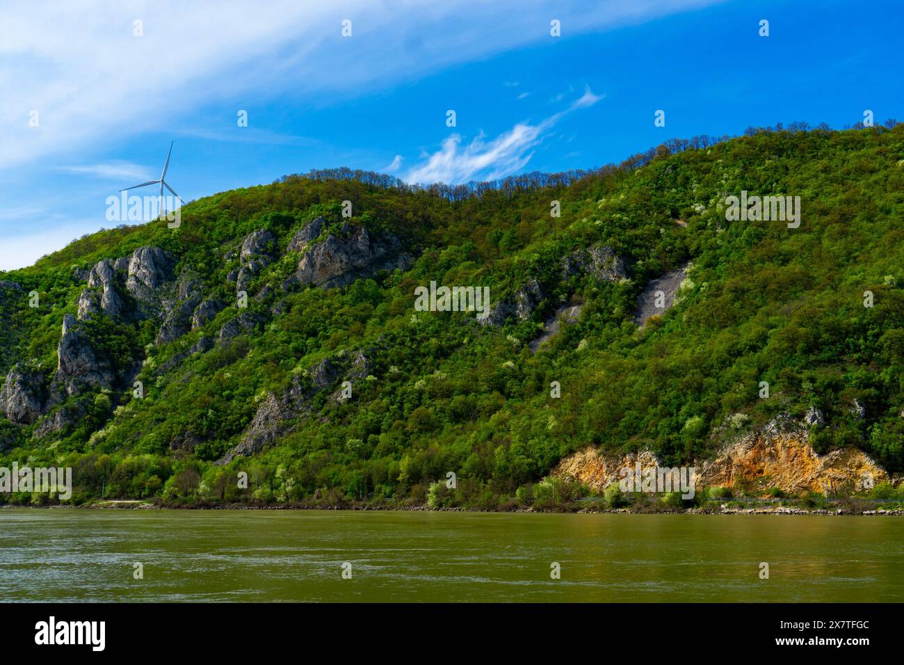 Majestic wind turbines harnessing renewable energy on the Danube River ...