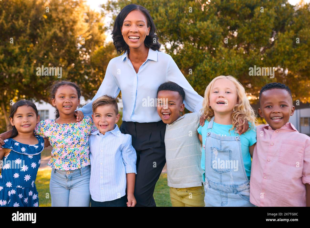 Portrait Of Female Primary Or Elementary School Teacher With Multi ...