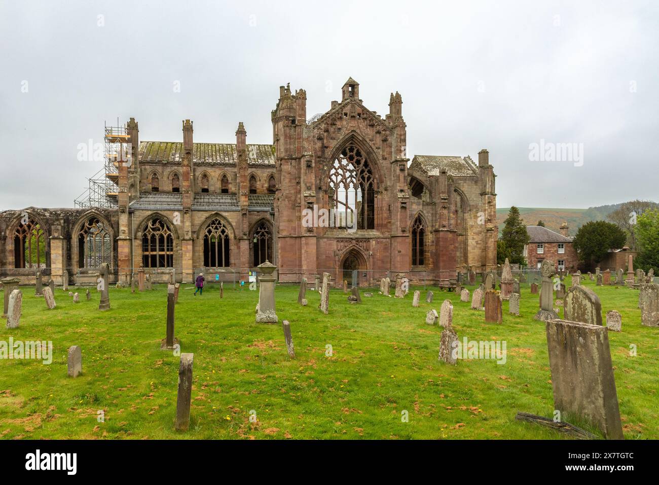 The ruins of a Gothic-style monastery in Melrose in the Scottish ...