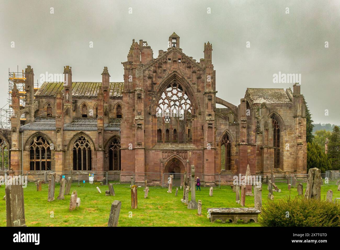 The ruins of a Gothic-style monastery in Melrose in the Scottish ...