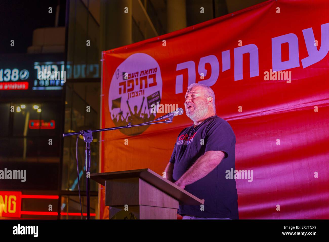 Haifa, Israel - May 18, 2024: Protest leader Gonen Ben Itzhak speaks to ...