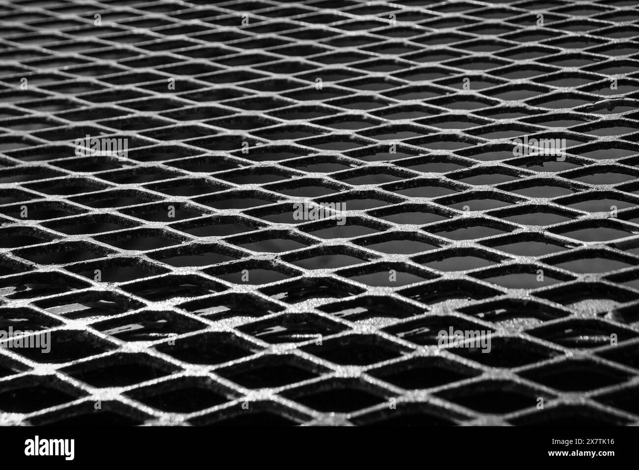 a black and white metal grid pattern background Stock Photo - Alamy