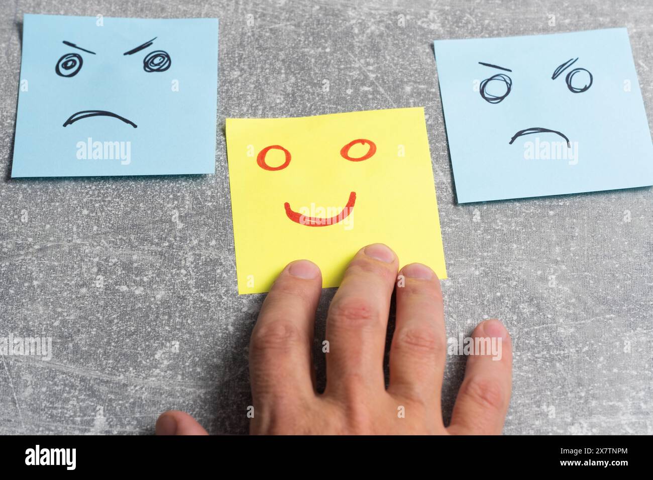 Concept positivity. Person chooses positive emotion drawn on three ...