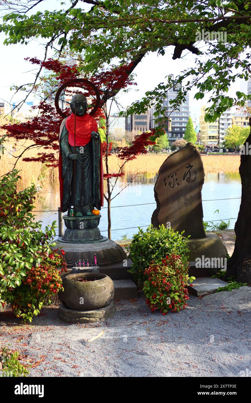 buddhist statue in Shinobazu pond in Ueno, Taito, Tokyo, Japan Stock ...