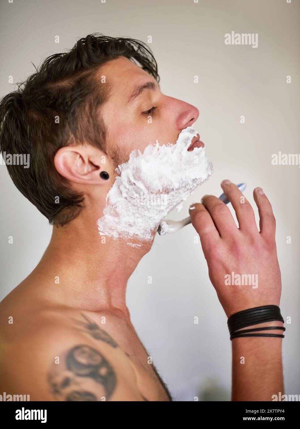 Man, shave and cream with razor blade for grooming, skincare or hair ...