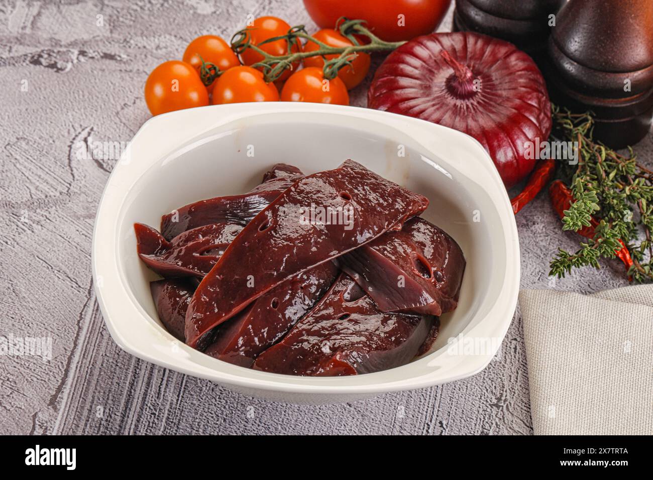 Raw dietary beef liver slices for cooking Stock Photo - Alamy