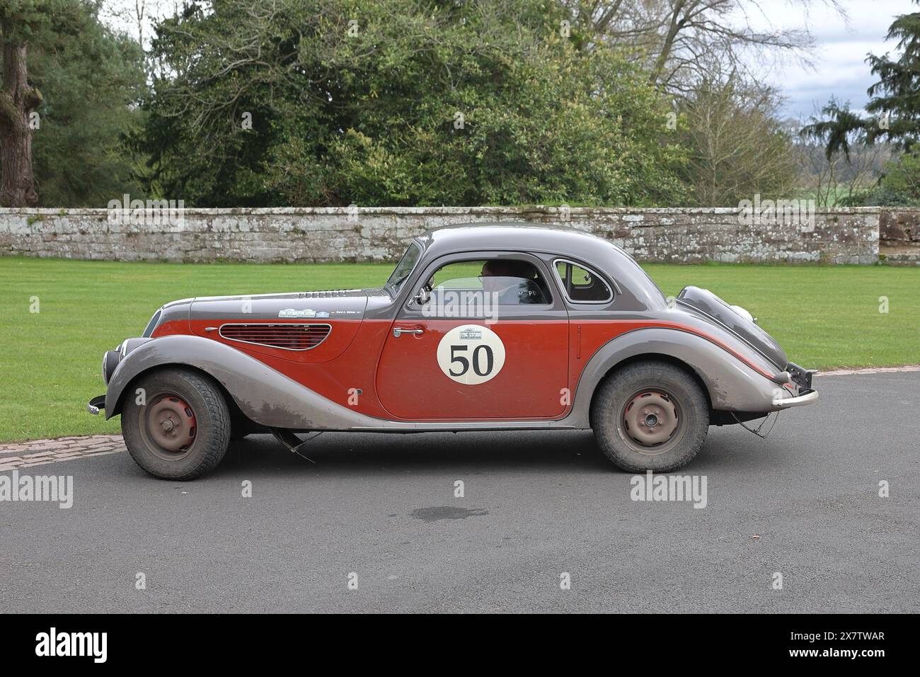 A 1938 BMW 327/28 arrives at Rose Castle in Dalston, Cumbria. The car ...